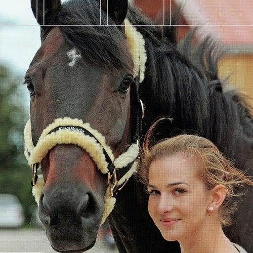 Lisa Muller Riding A Horse