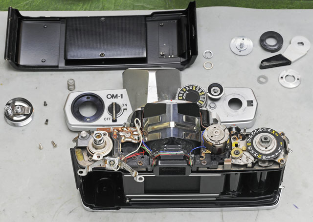 Exploring the World of Film Cameras and Lenses: Olympus OM-1 top ...