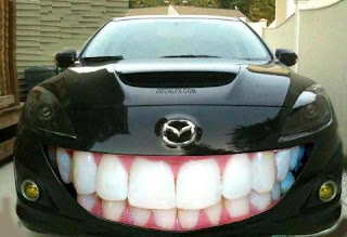 Sharing is caring...: A smile from Mazda