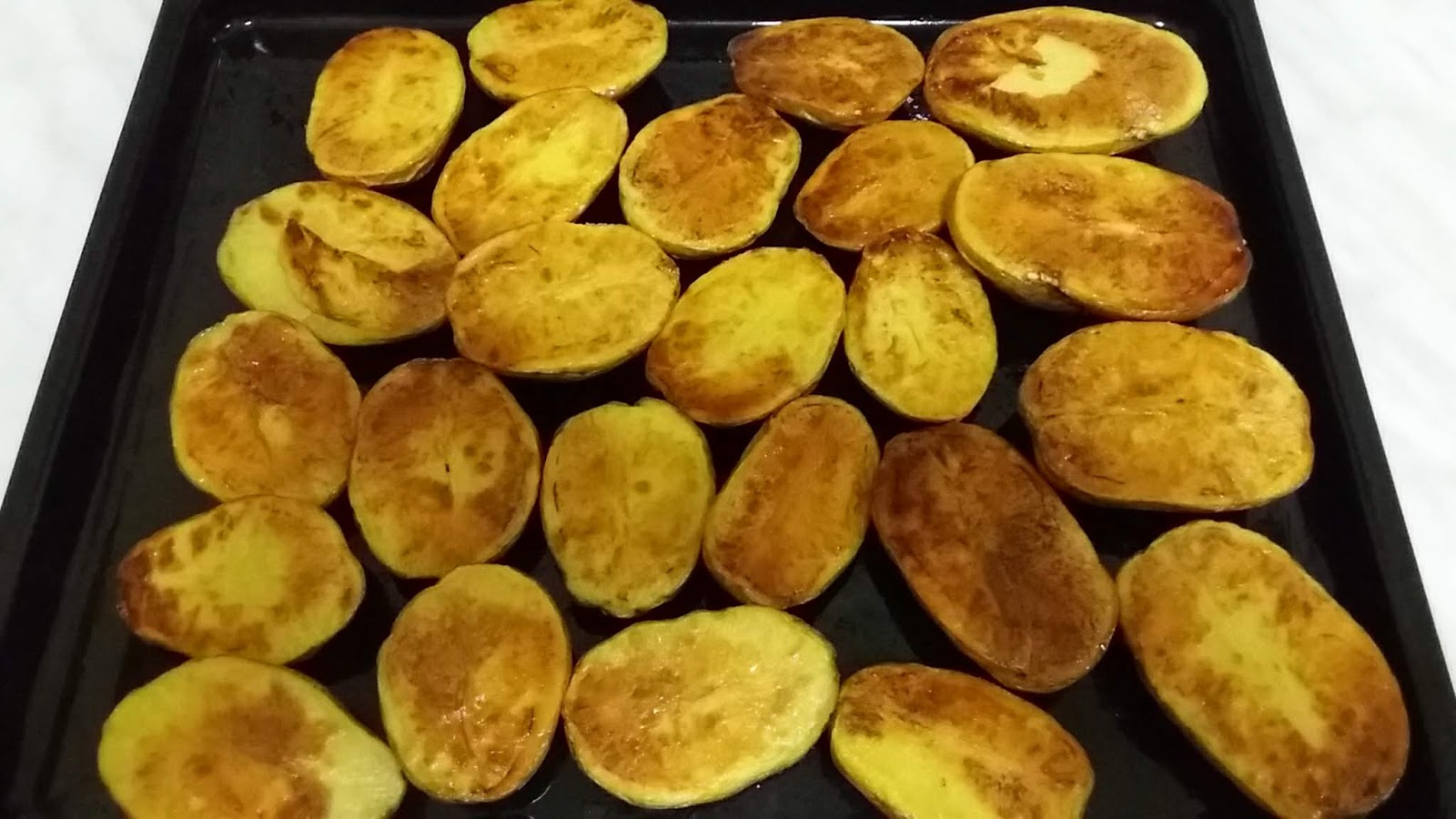 Rozi erdélyi,székely konyhája: Hagyományos tepsis sült pityóka (krumpli)