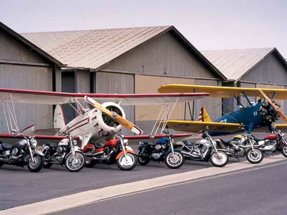 MATTHEW 25 BIKER: standing on the runway watching all the planes take off