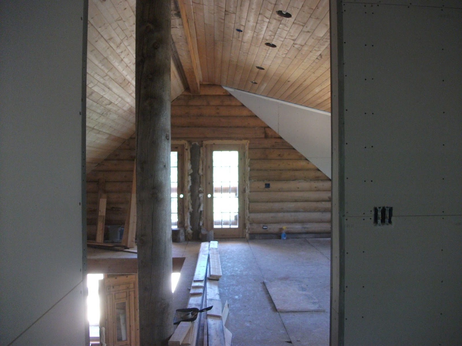 LOG CABIN: Drywall and fire place mantel June 20, 2012