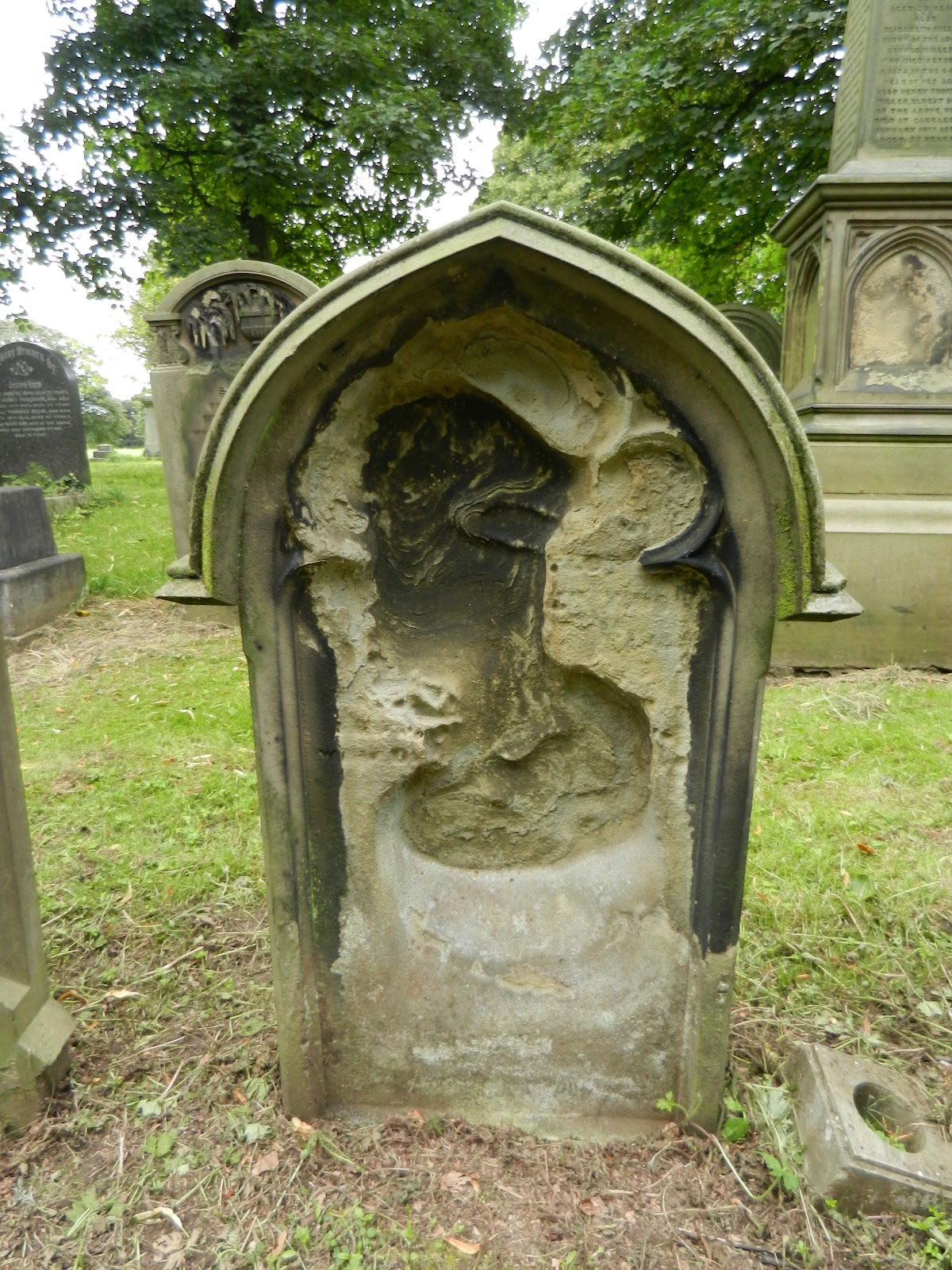 The Graveyard Detective: Eroded Headstone