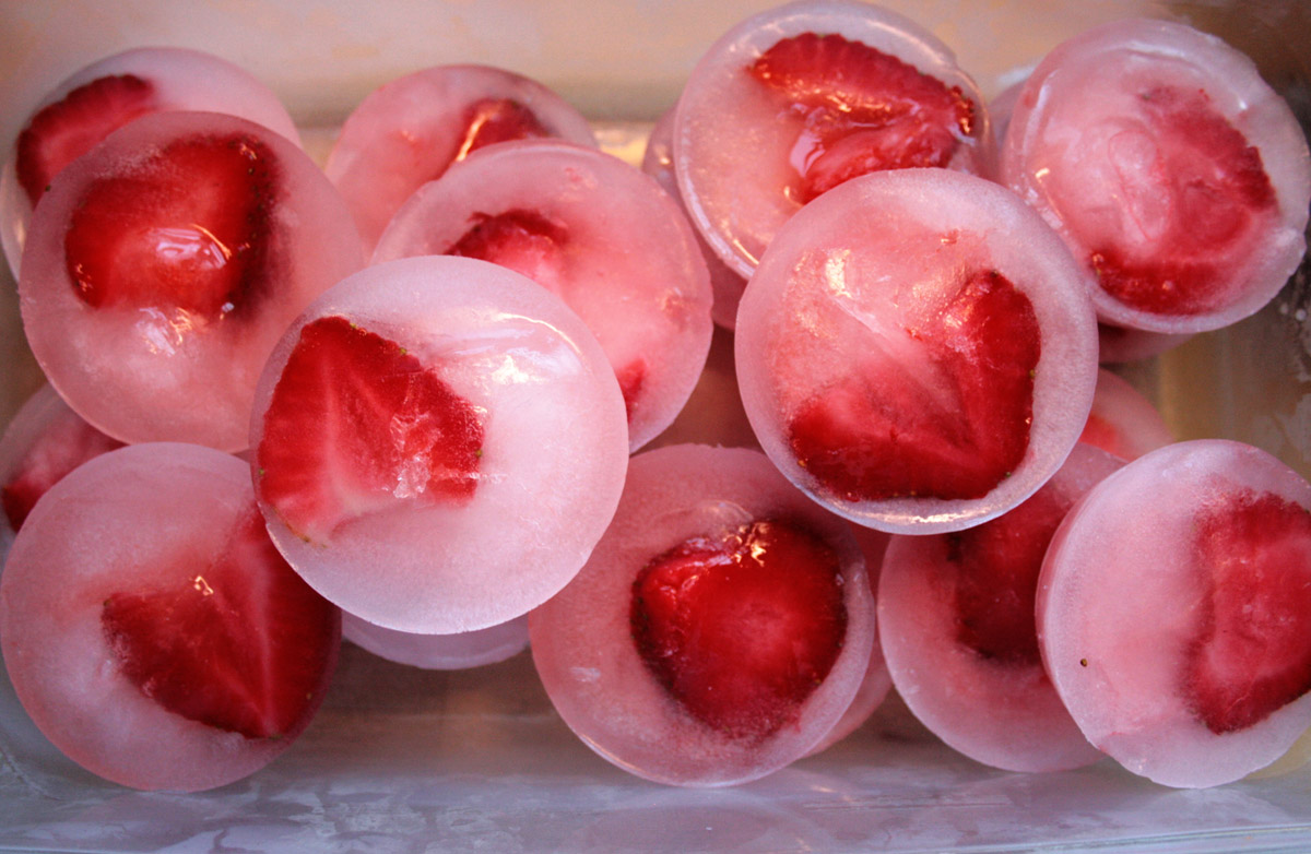 *kimw*: Heart-shaped-strawberry-pink-ice cubes.