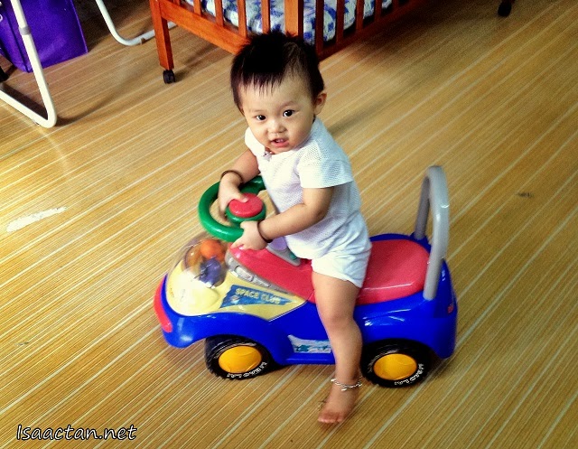 Isaactan.net: Baby Martin Driving His "New" Toy Car