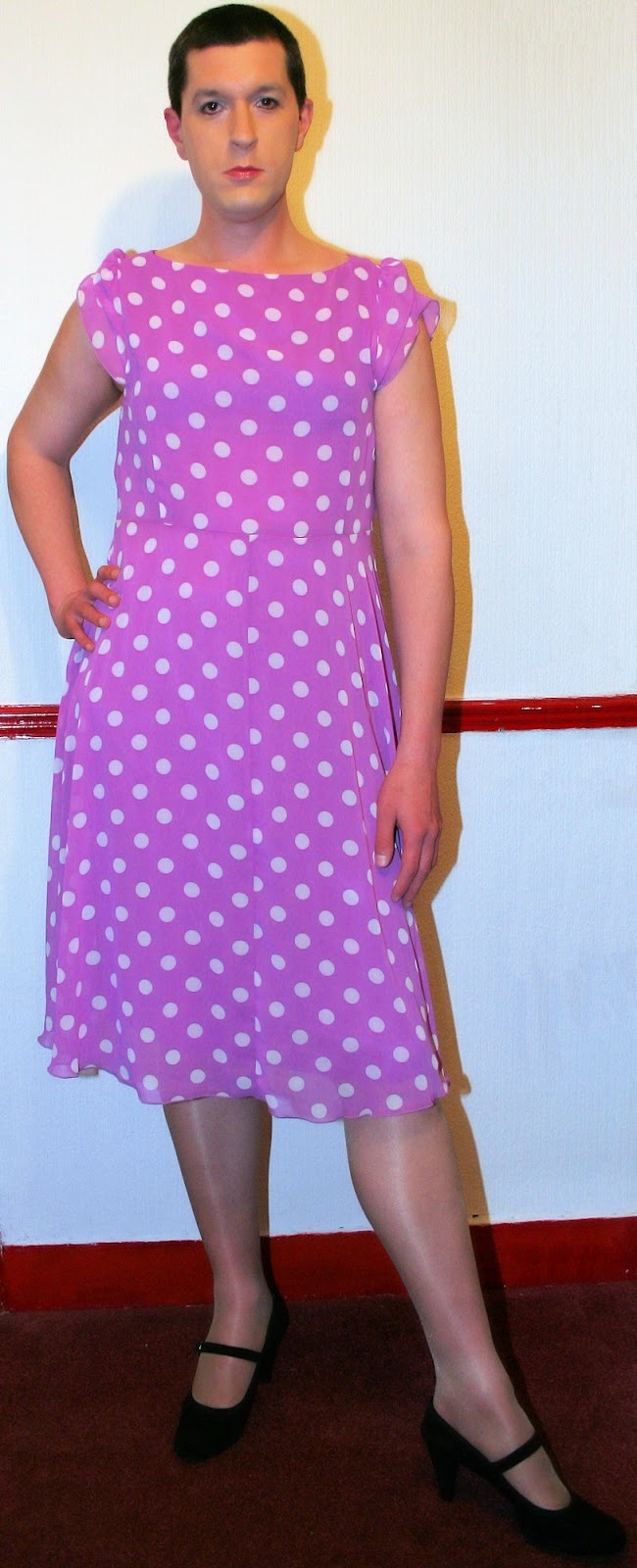 Chris Millett: Chris Millett, Dress, tights and heels