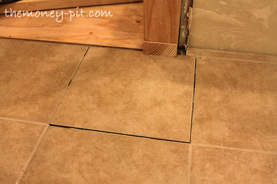 And luckily the previous owners left an extra box of these tiles in the ...