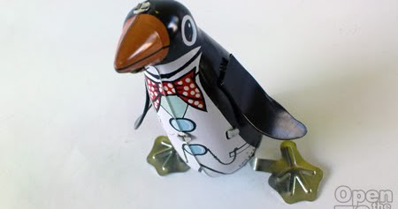 Penguin wind-up tin toy