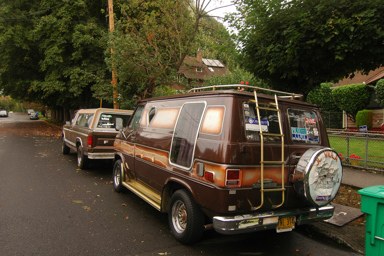 OLD PARKED CARS.: 1982 Chevrolet Red-E-Kamp Van.