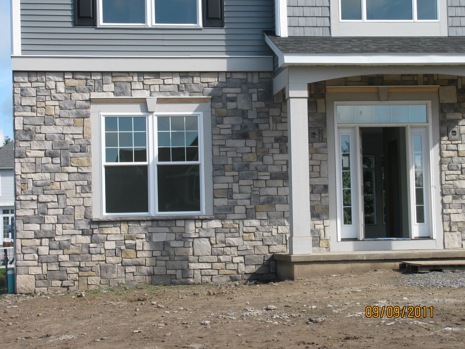 Nit's News: Siding, Stone and Primed