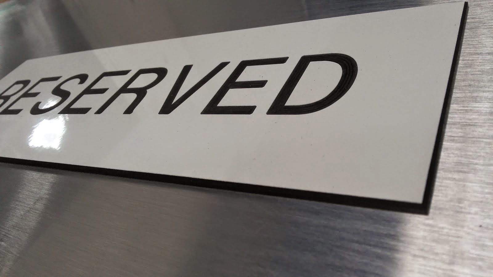 The Green I Signs Blog: RESERVED engraved car parking bay signs ...
