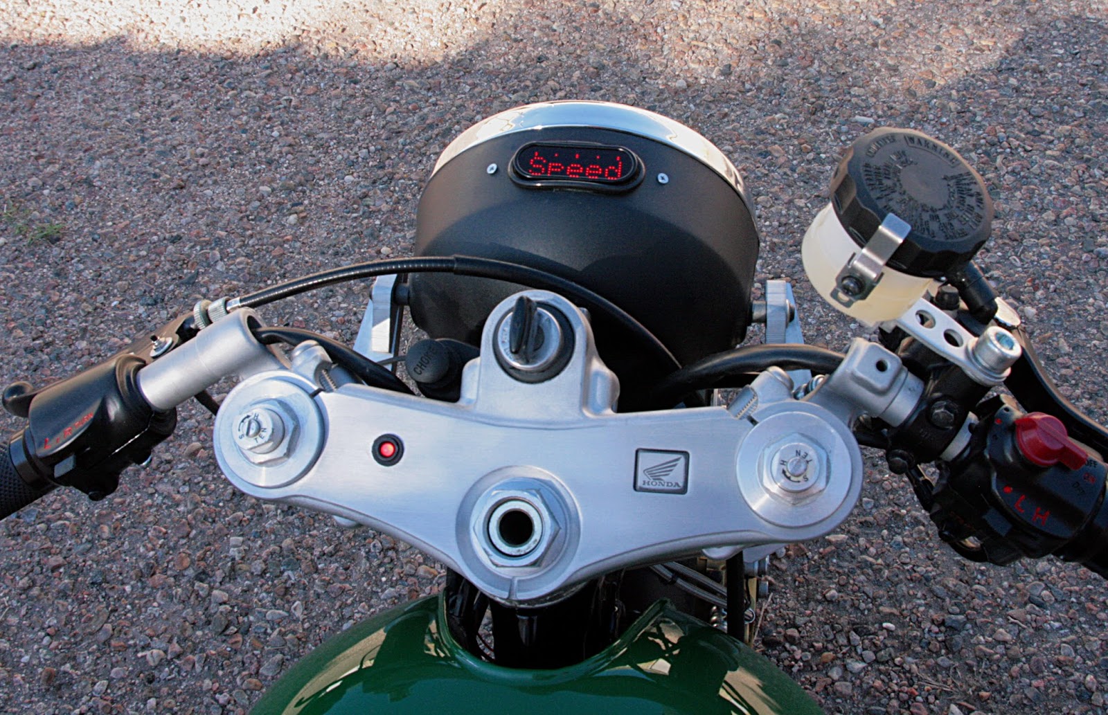 Rusty Bolt Garage CB750 - RocketGarage - Cafe Racer Magazine