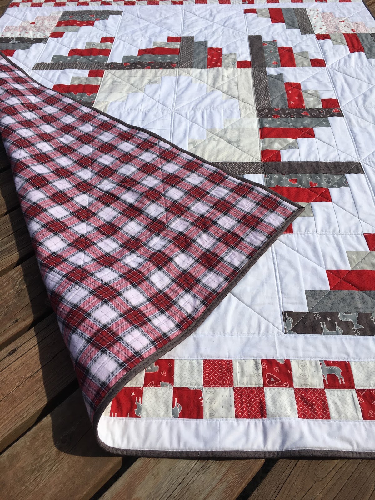 Fresh Dew Drops: Reindeer Quilt - A JOL Jelly Roll Log Cabin Quilt