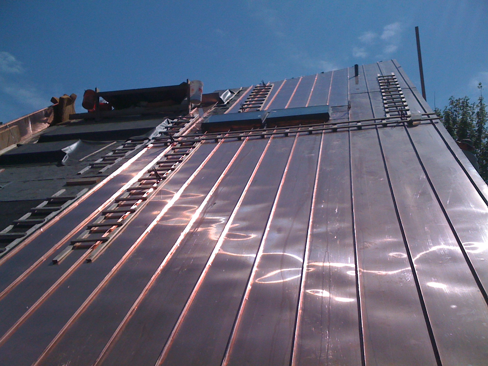 Architectural Sheet Metal Work: Copper roof, standing seam addition.