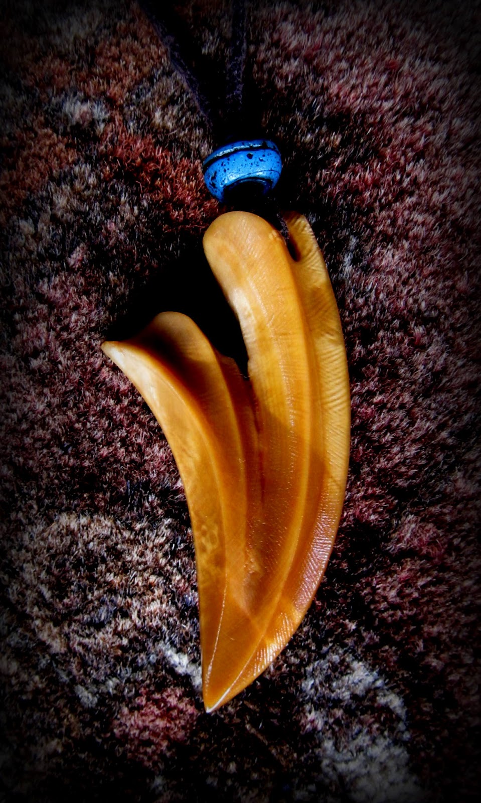 "ANCIENT AMULET IVORIES"