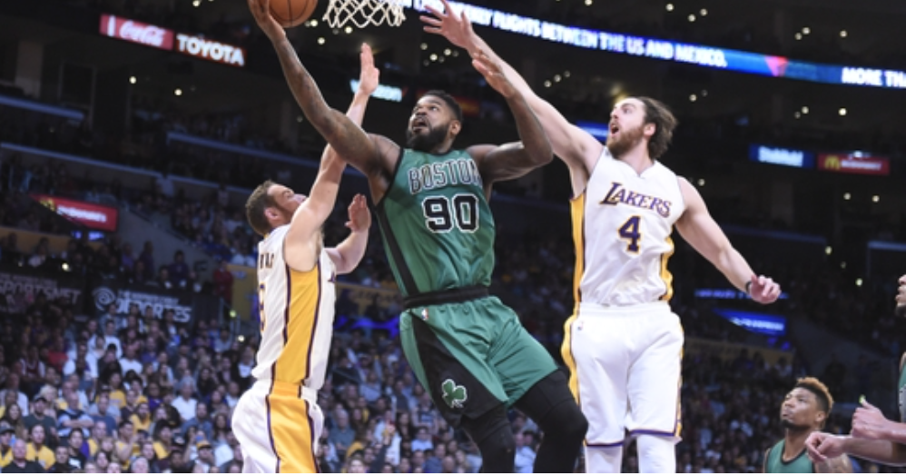 Celtics beat Lakers 107-100, clinch playoff berth