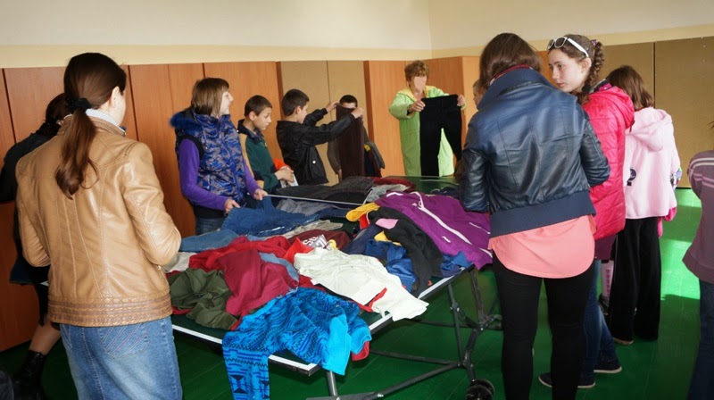 Bible Orphan Ministry: Giving clothes to the orphans