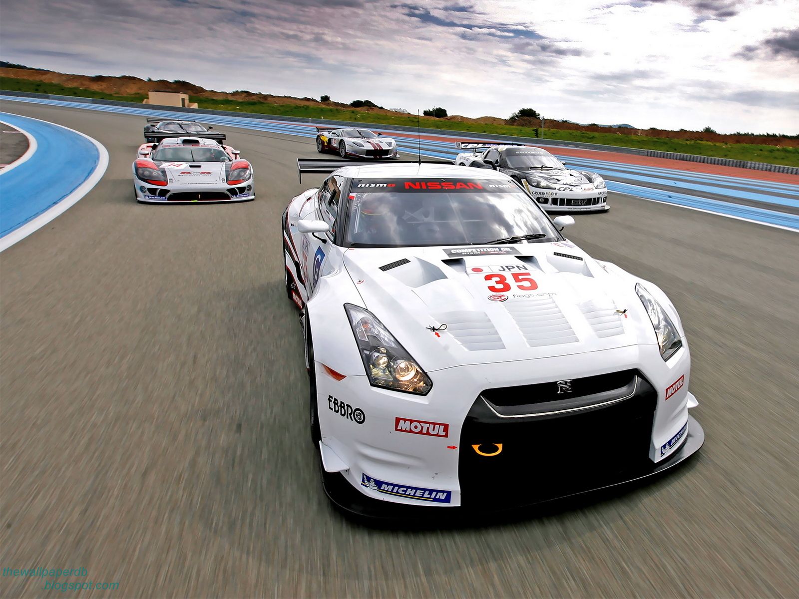 Nissan GTR leading on race track wallpaper ~ The Wallpaper Database