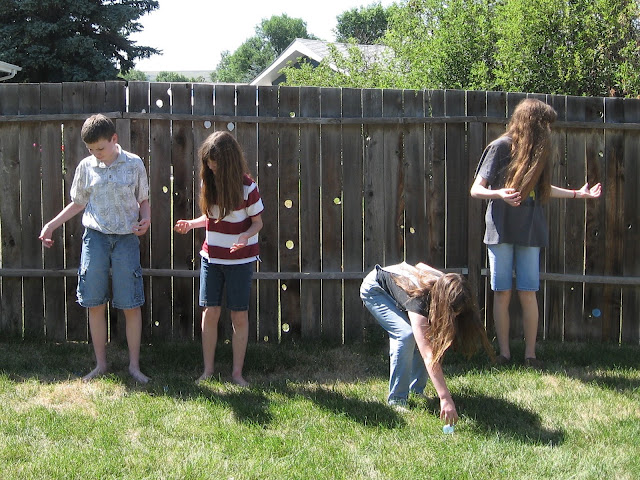 Almost Unschoolers: Summer Challenge - Learn to Juggle with Water Balloons