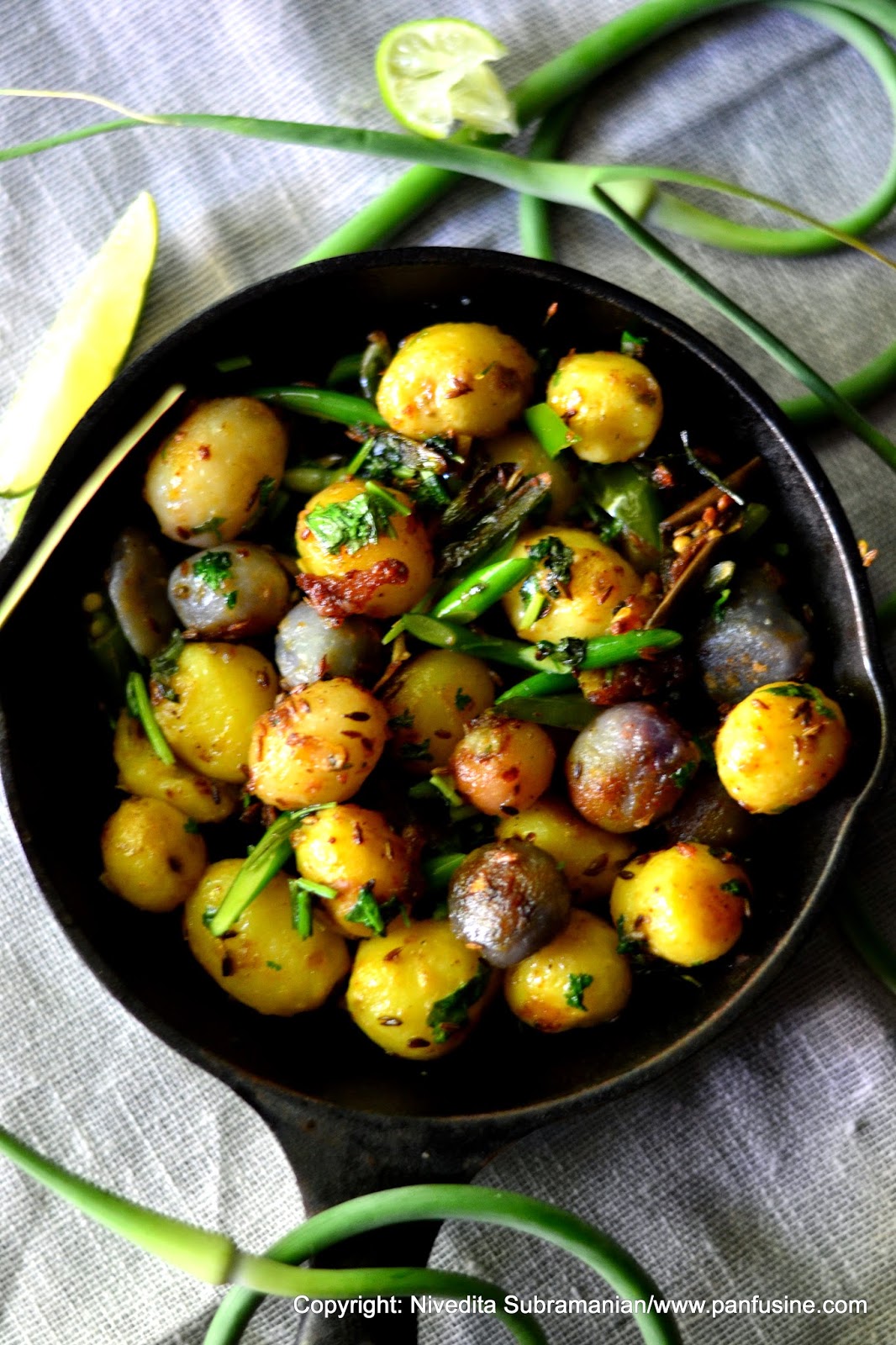 Day 189 - Pan fried Fingerling potatoes with Garlic Scapes
