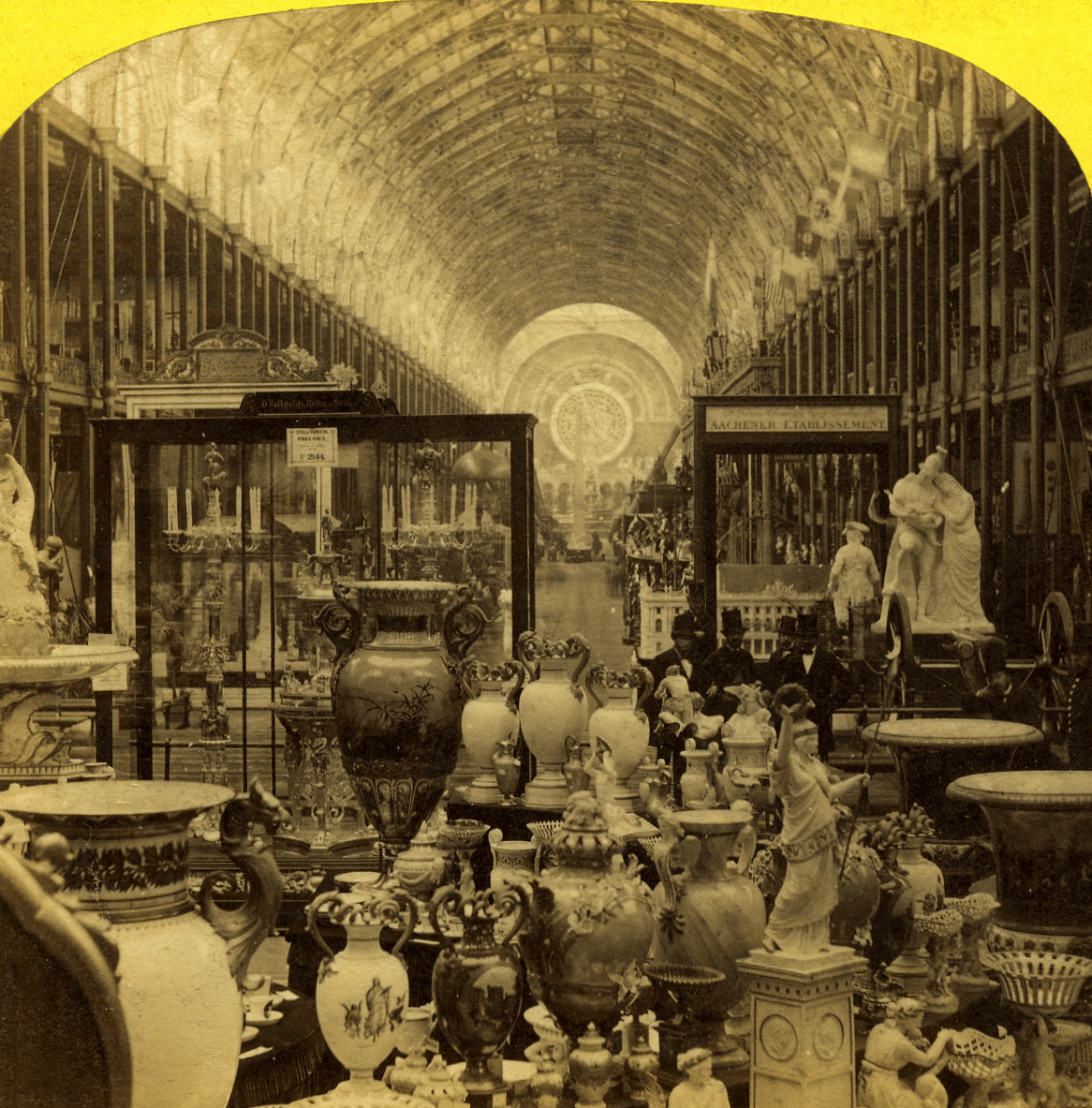 View of displays and visitors in the interior of the 1862 International ...