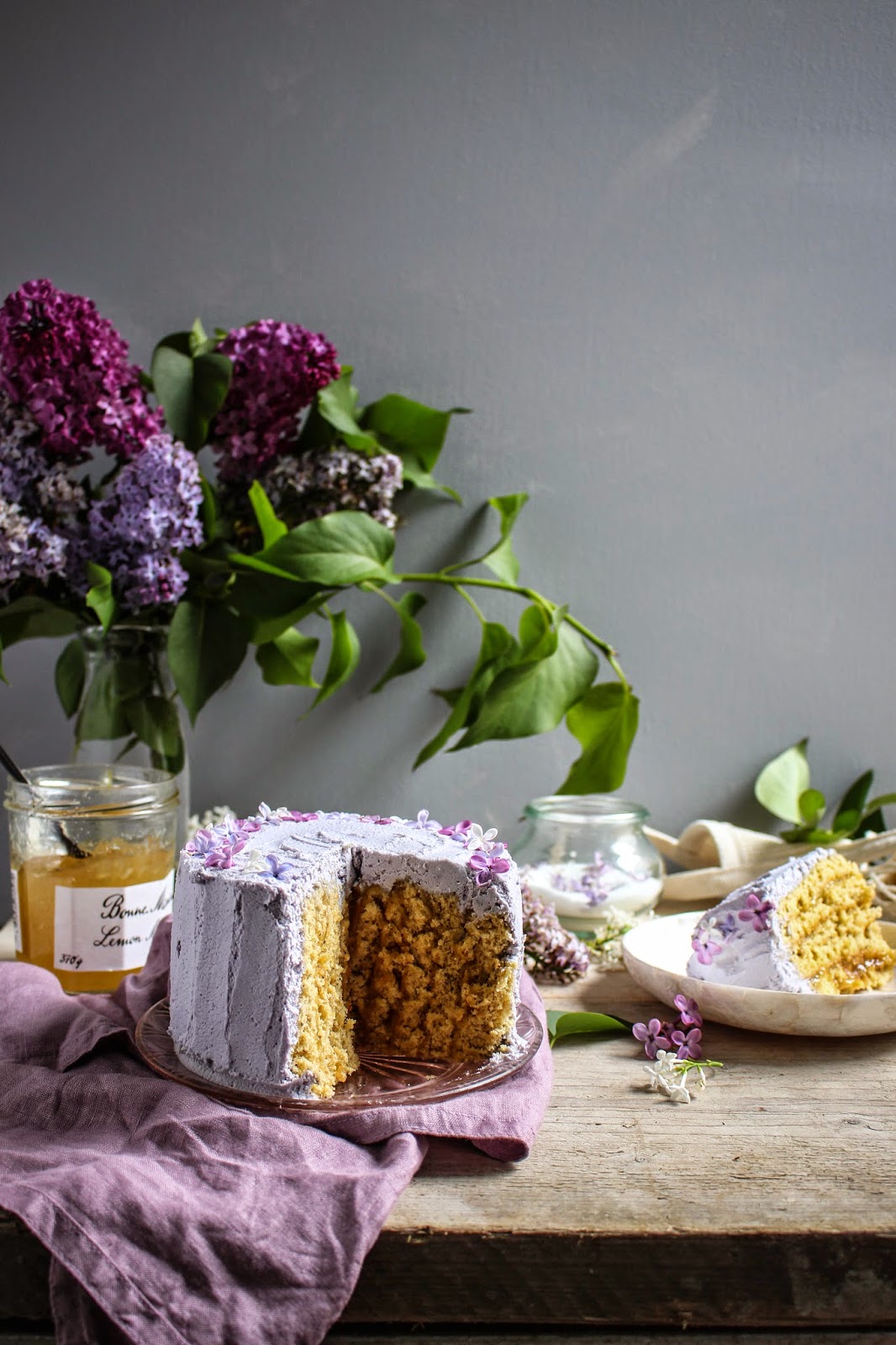 earl grey and lemon verticle roll cake with lilacs