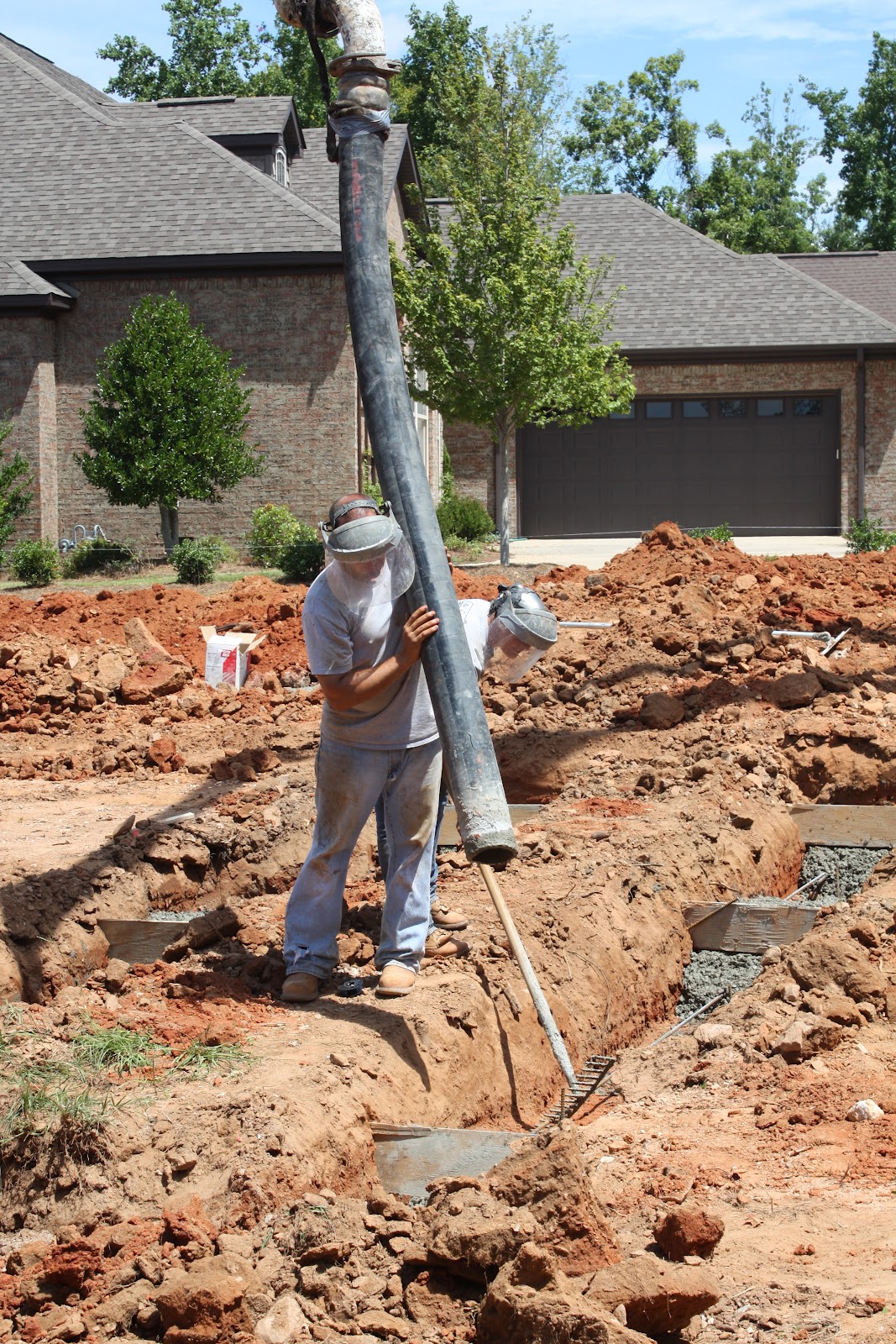 Home, Home on the Plains: Digging Footers and Pumping Concrete