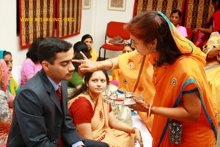 Why do we wear marks (tilak, chandan, kumkum and the like) on the forehead?