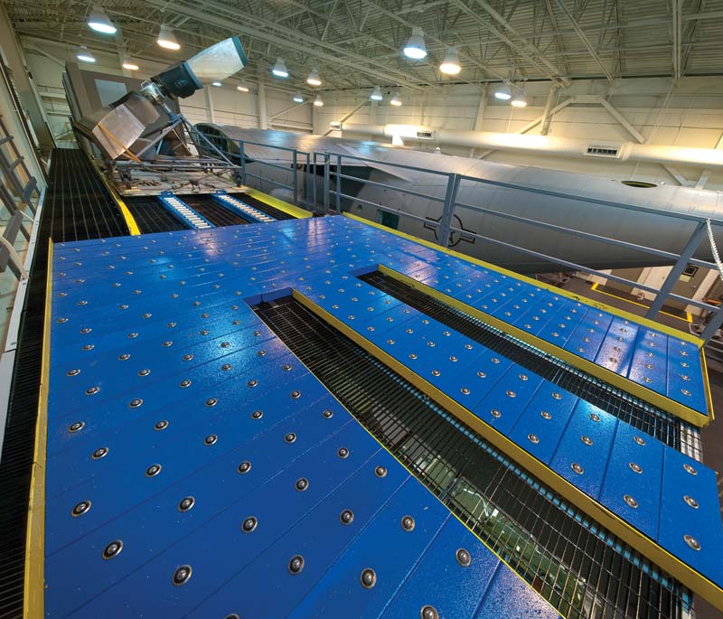 American Warehouse Systems: 463L Pallet Conveyor System at FL Air Force ...