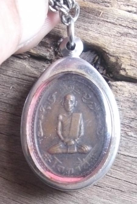 Buddhist Amulets: Luang Por Opasi Monk Coin