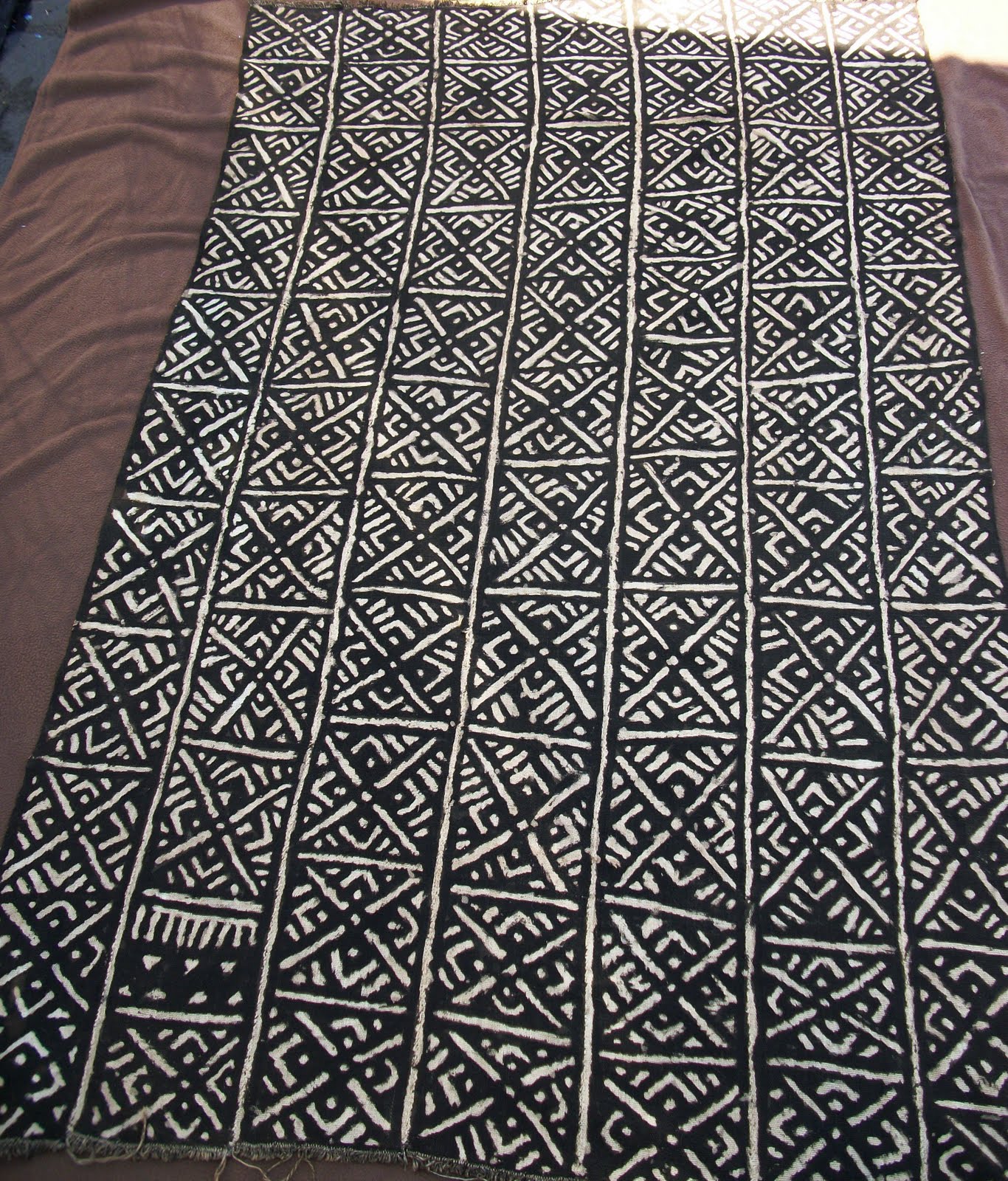 OHMIMOLA: Mud in the Cloth