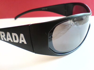 Pyl-Relojes: LENTES PRADA NEGROS UNISEX