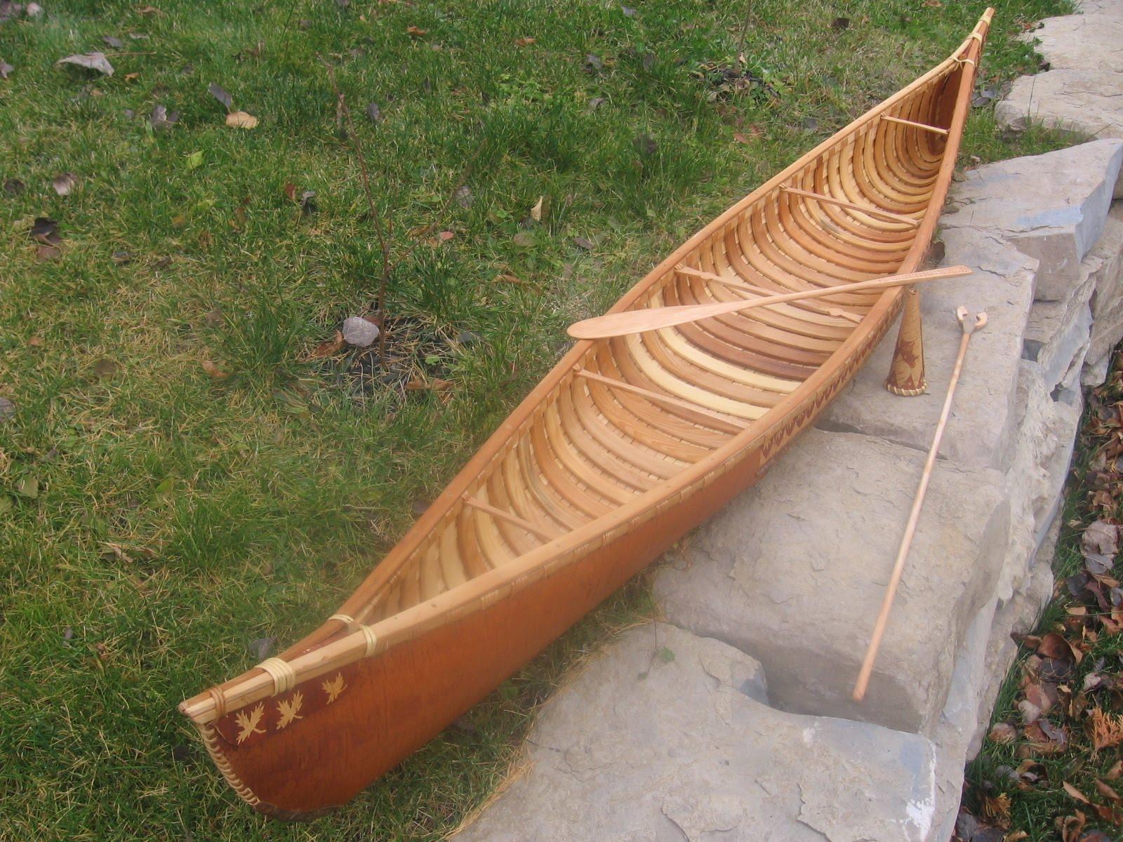 Building birch bark canoe ~ Fraser Yachts