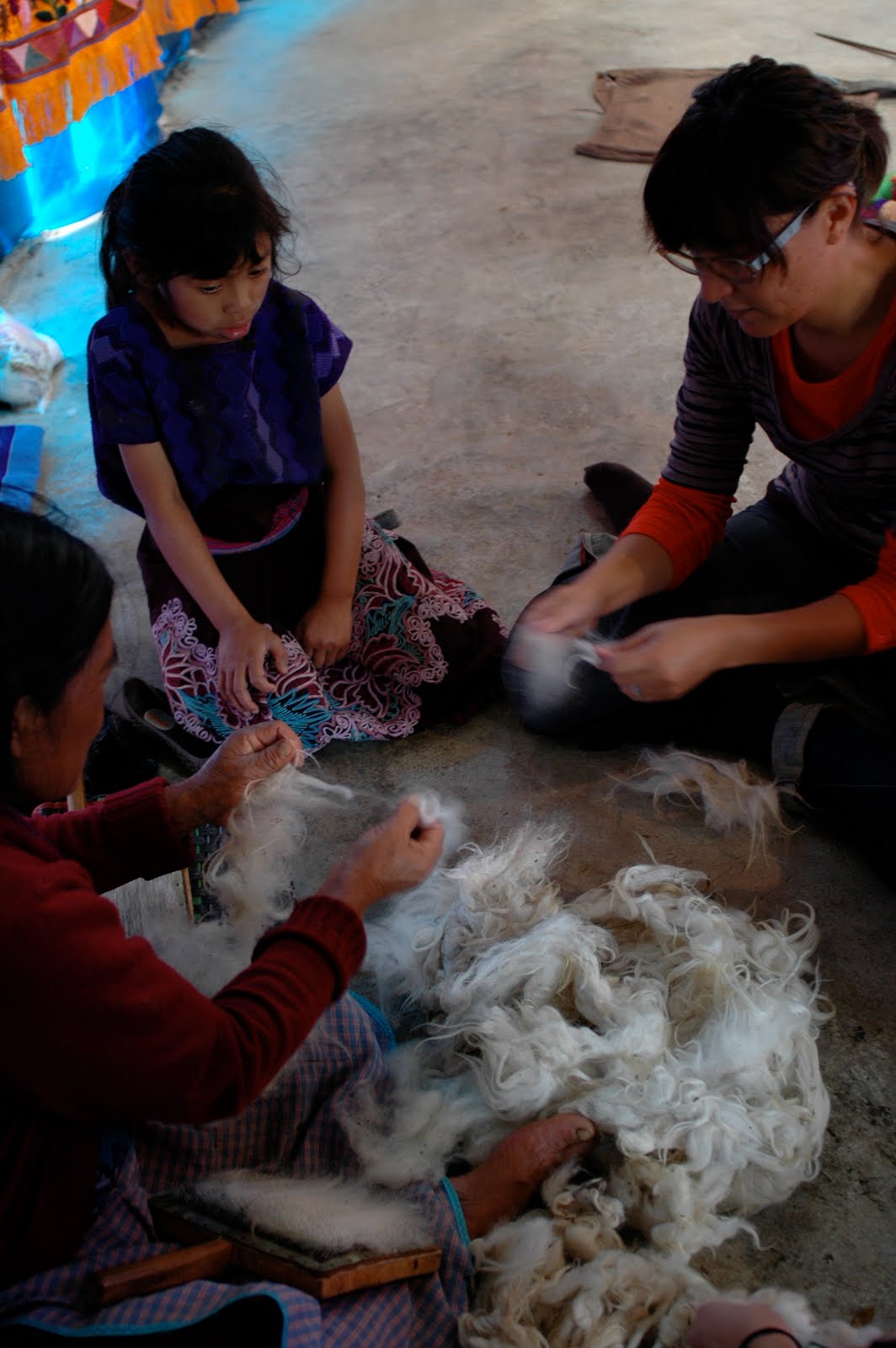 Artists Helping Artisans: Preparing wool stage 2 - brushing and spinning