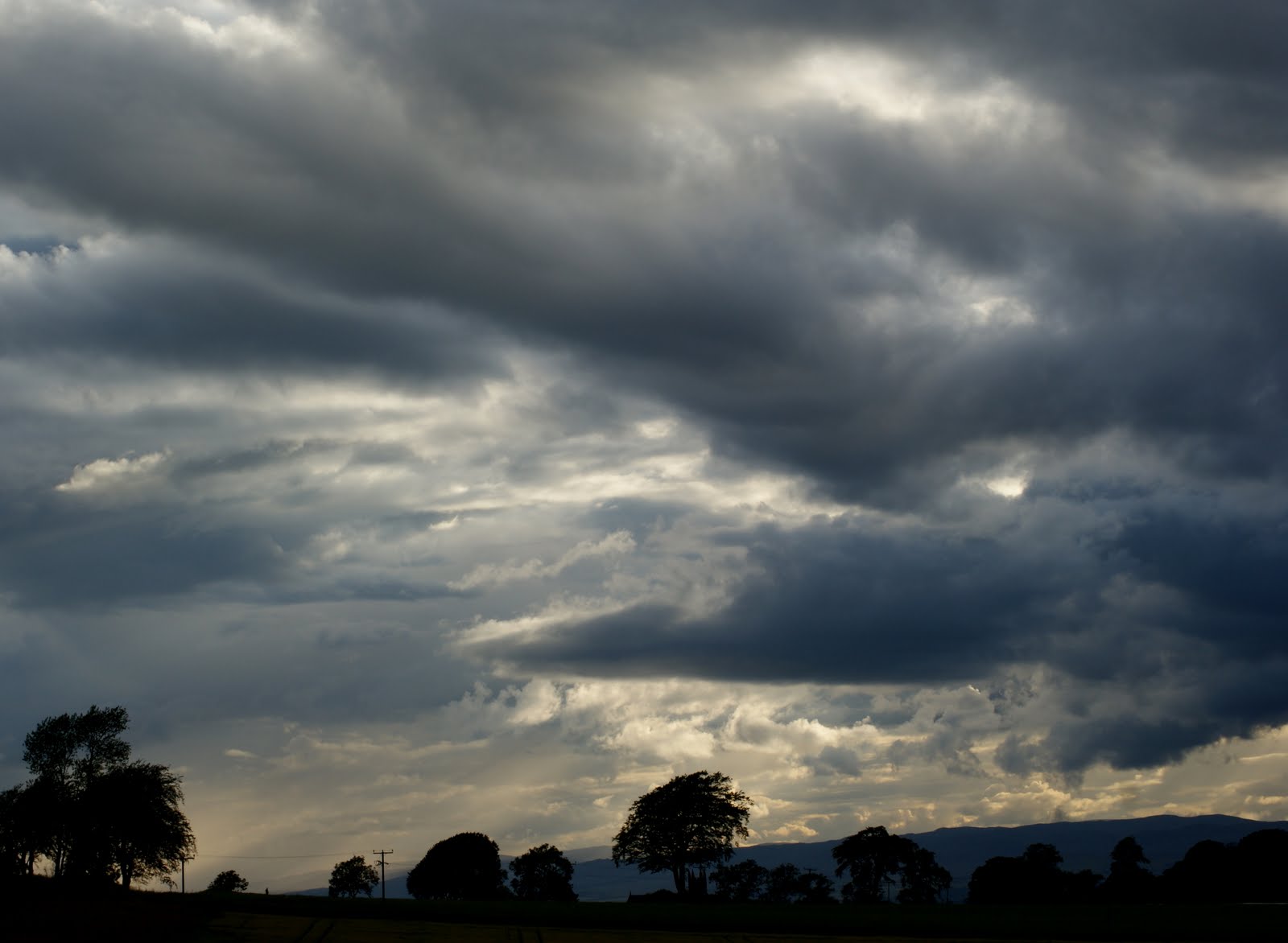 Tour Scotland: July 26th Photograph Rain Clouds Scotland