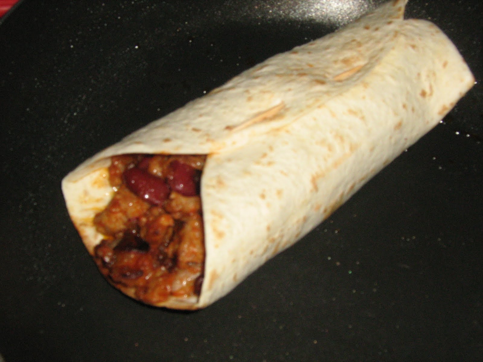 Tex mex: Tortillas ripiene con salsiccia e fagioli
