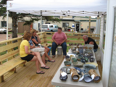 Gallery logo: Peggy and Brian Lundberg pottery demo