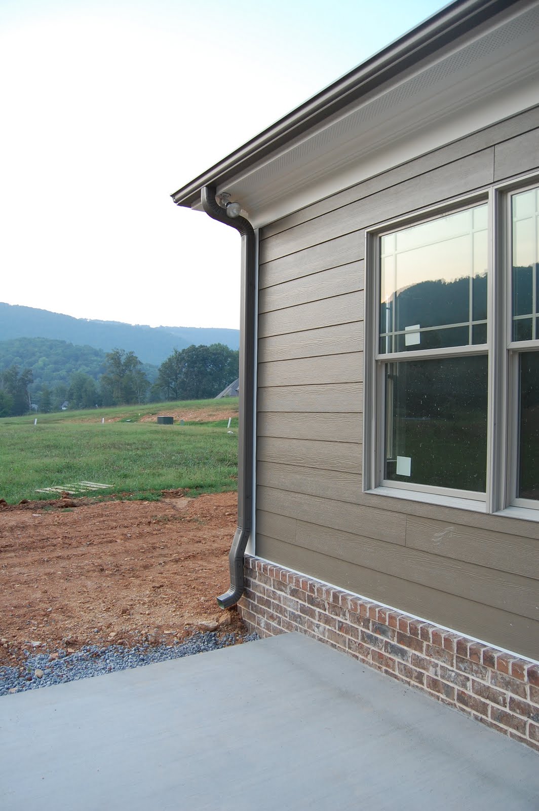 Home Building Project: Gutters, Staircase, Mailbox, & Garage Doors