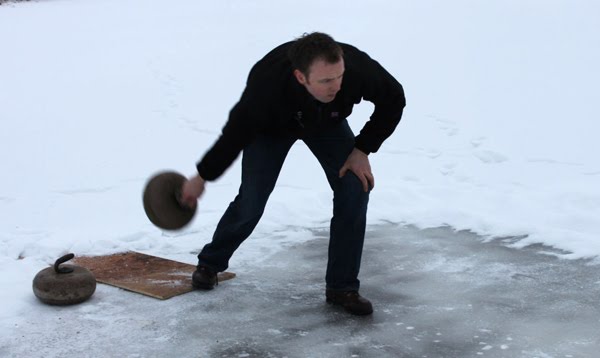 Skip Cottage Curling: Curling on a puddle