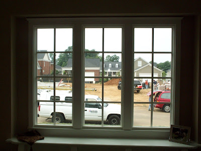 Louisville Blinds and Drapery: Triple window of shutters