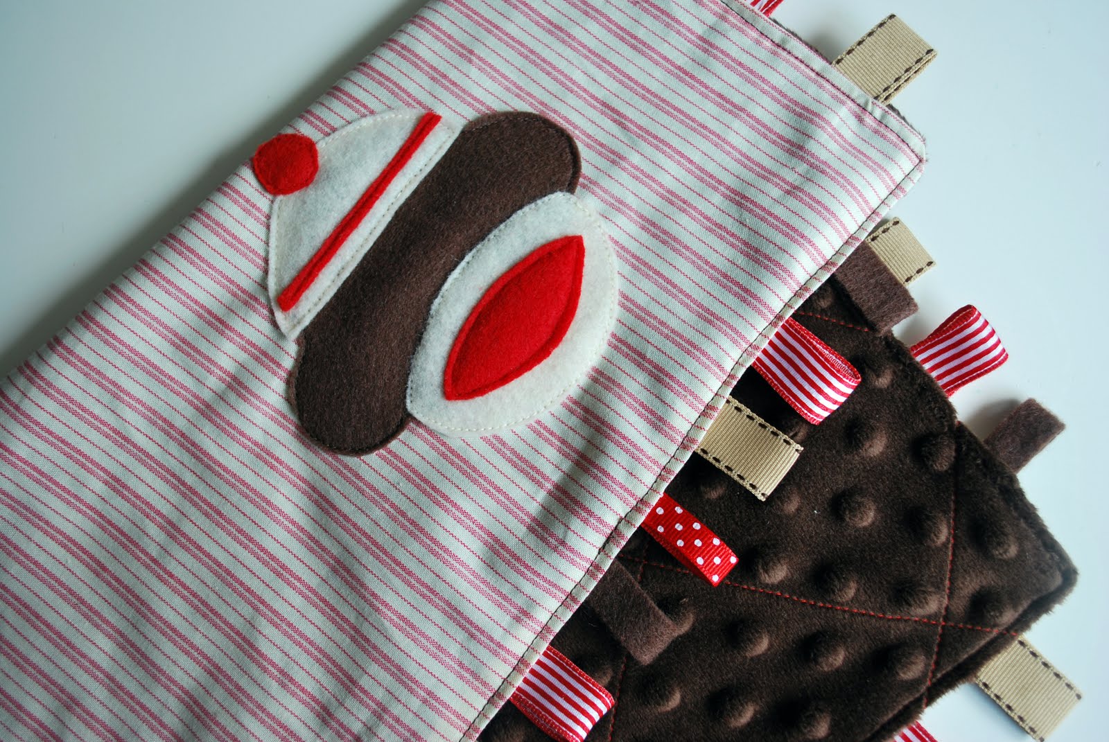 Larissa Another Day: Sock Monkey Snuggle Square Tutorial