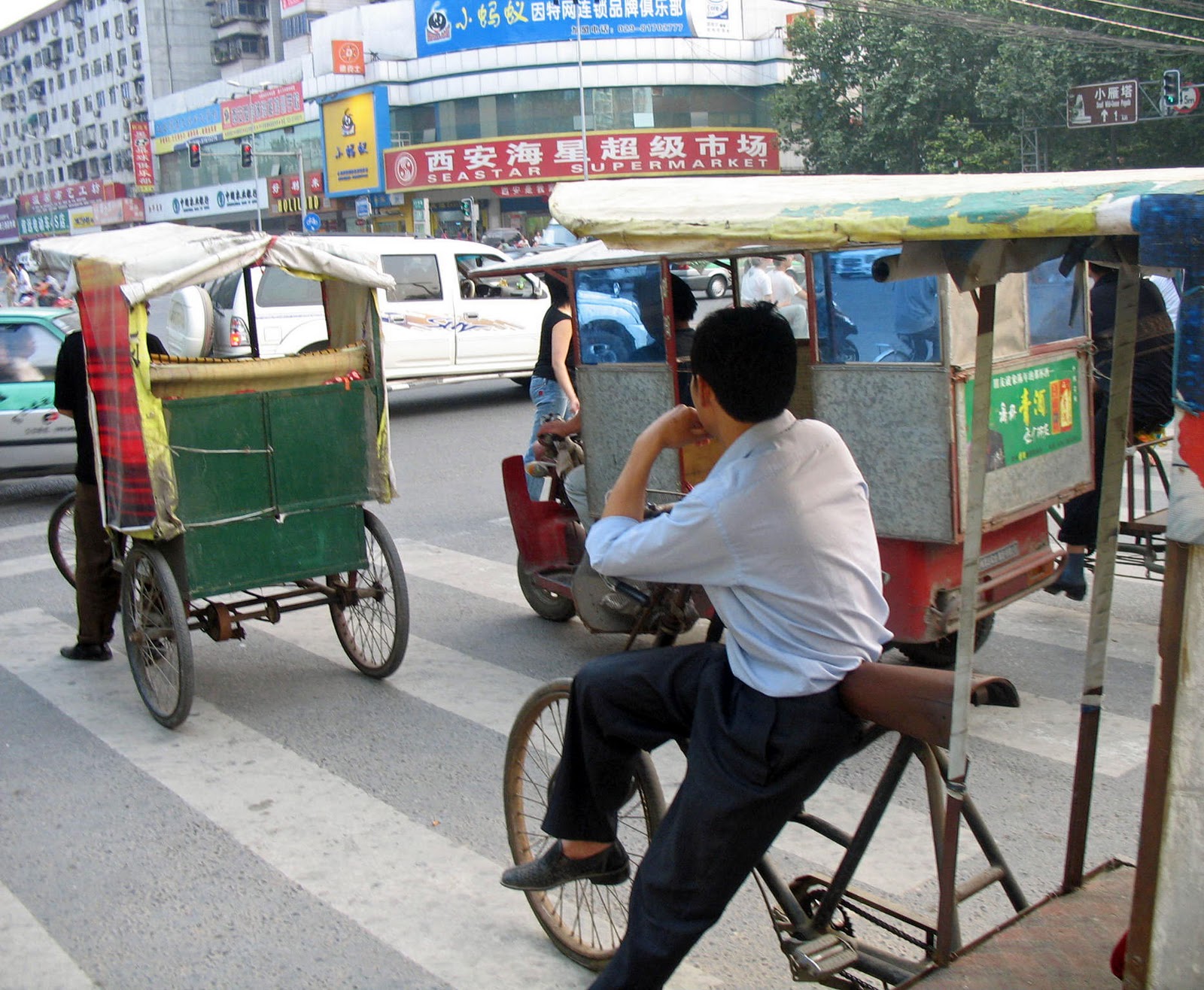 Stock Pictures: Auto Rickshaws and Cycle Rickshaws in China