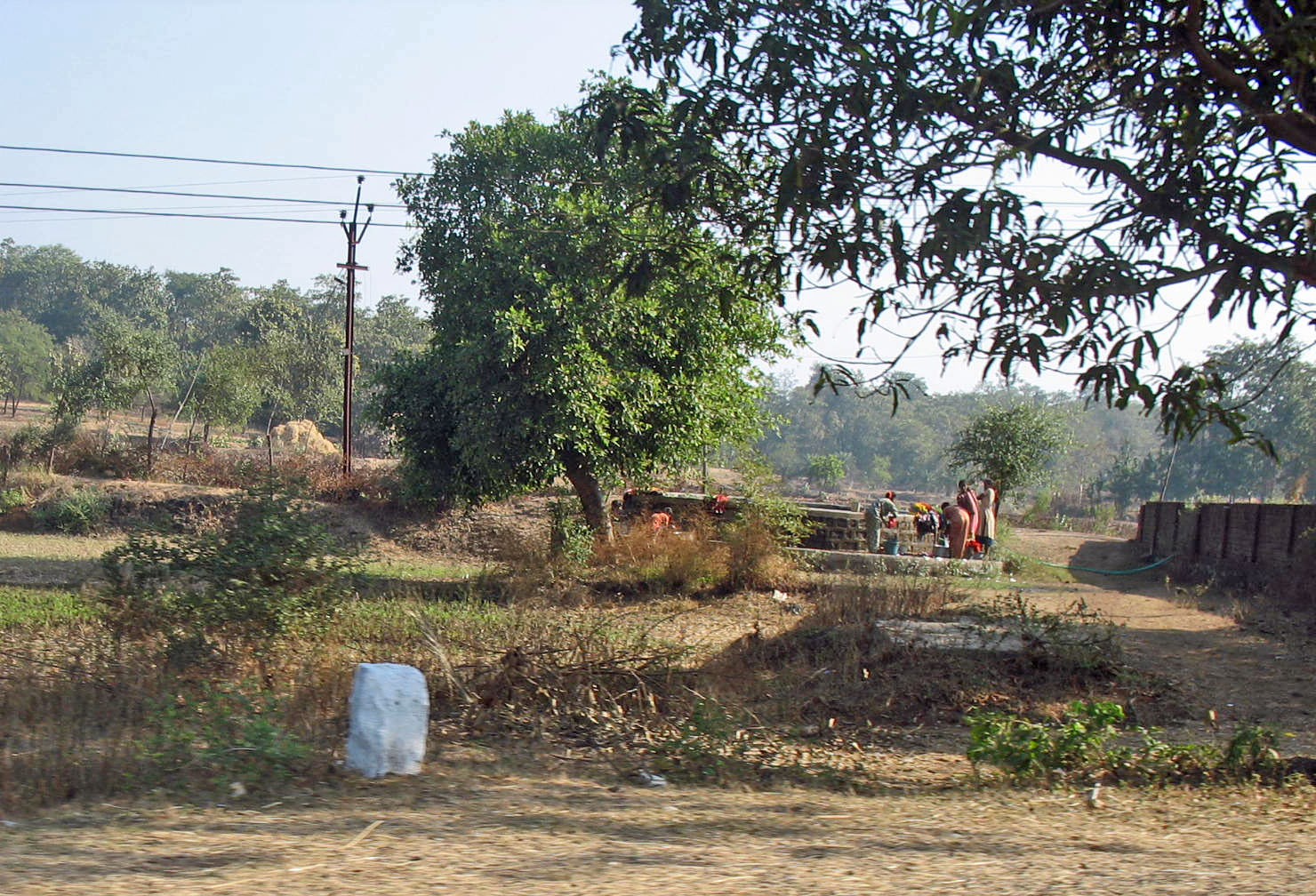 Stock Pictures: Women filling water from village well in India