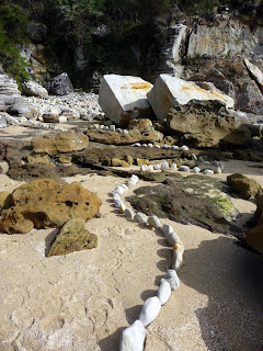 Playing with rocks and shells
