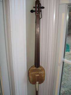 the gittershop: Two string turtle shell and deer hide instrument