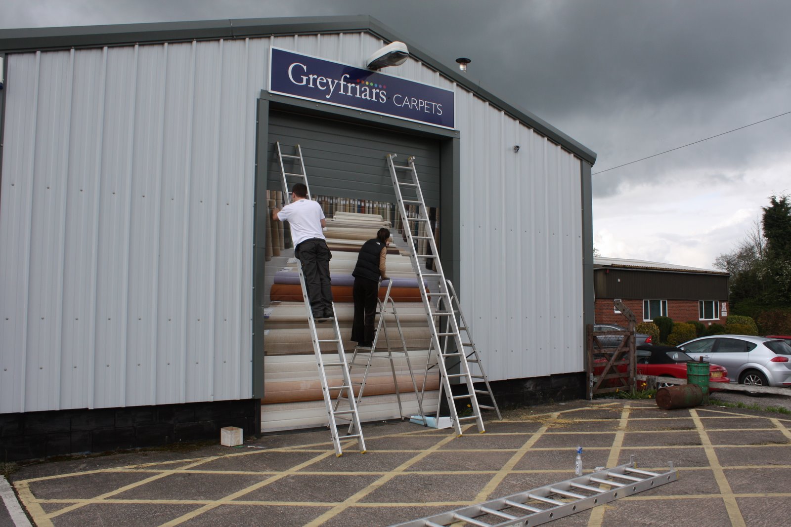 A Sign Makers Blog: Vinyl Wrapping a Roller Shutter Door
