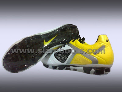 football boots: BLACK AND YELLOW CTR 360 II