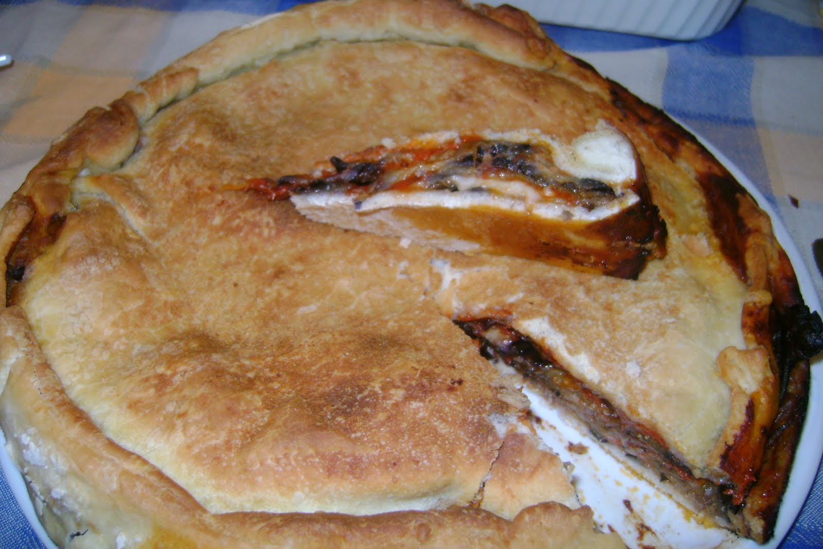 Un po' di zucchero: Pizza ripiena di parmigiana