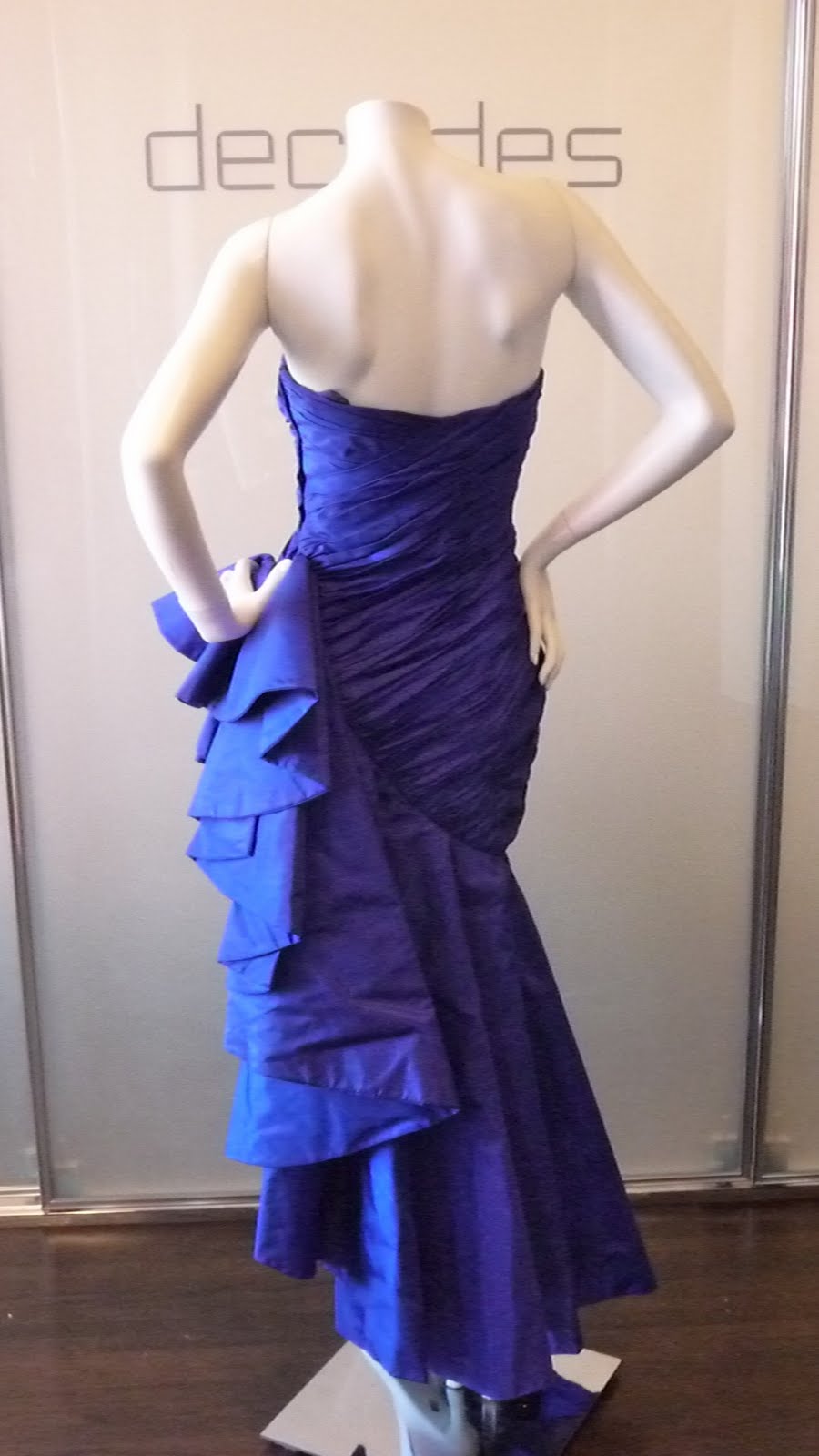 DECADES INC.: ELECTRIC AND ROYAL BLUE