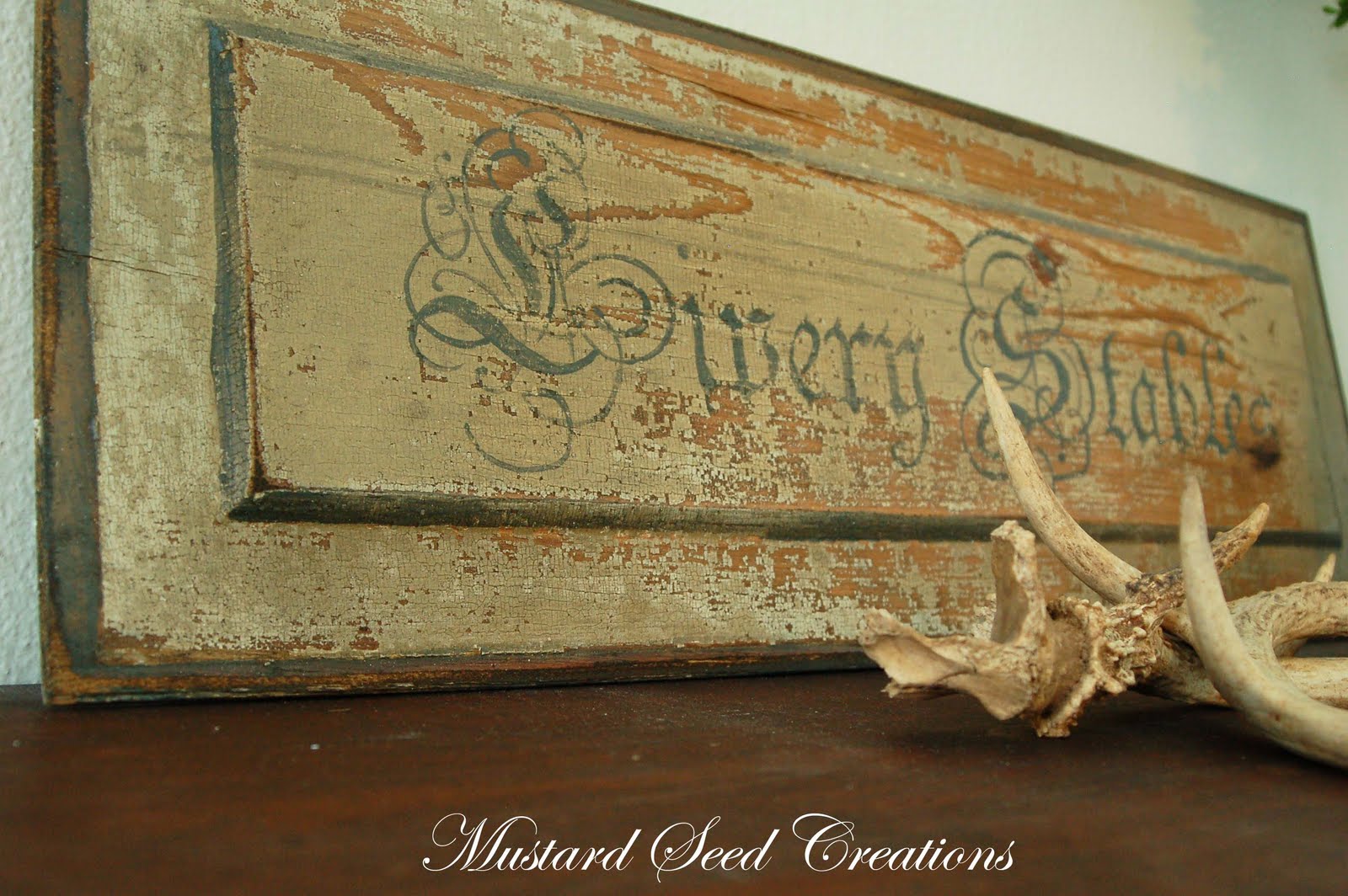 A Lamp & a Livery Sign